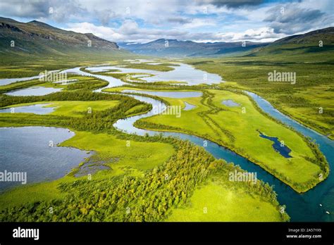 Aerial View Drone Shot Meandering River Landscape Of The Rapa Valley