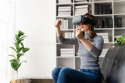 Surprised Young Latin Woman In Vr Headset Touching The Air Smiling