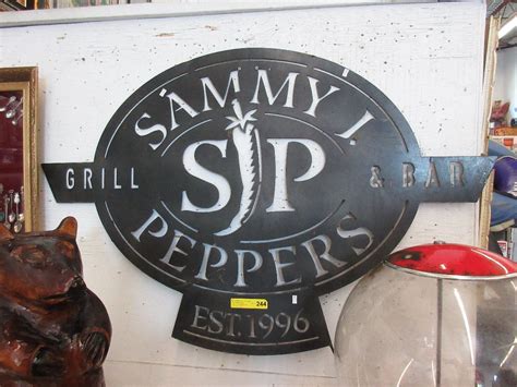 Metal Sammy J Peppers Sign