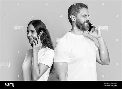 Mobile Phone Conversation Of Positive Couple Mobile Communication Of