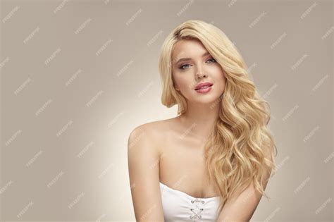 Premium Photo Beautiful Young Blonde Woman With Nude Makeup Has A