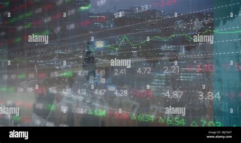 Financial Data Glowing Over City Highways At Night With Green Line Graph Data Indicators