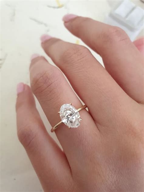 Gold Oval Solitaire Engagement Rings