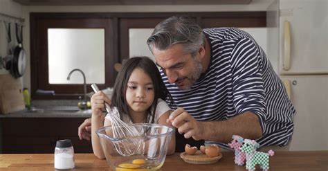 Dad Cracking Eggs For Her Daughter Free Stock Video Footage Royalty