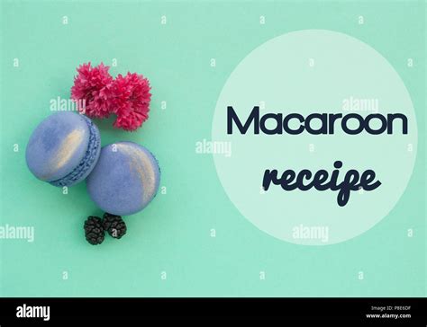 Two Violet Color Macaroons With Golden Strokes And Beautiful Flowers On