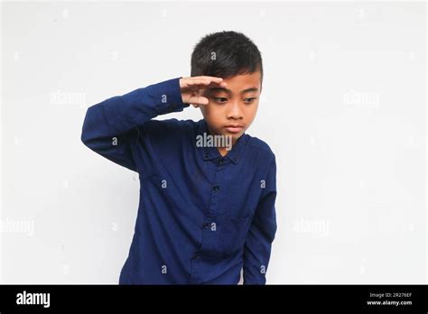 Curious Boy Looking And Find Something Isolated On The White Background