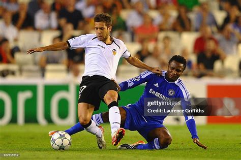 Jordi Alba Of Valencia Is Tackled By Jon Obi Mikel Of Chelsea During News Photo Getty Images