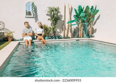 Brother Sister Relaxing By Swimming Pool Stock Photo Shutterstock