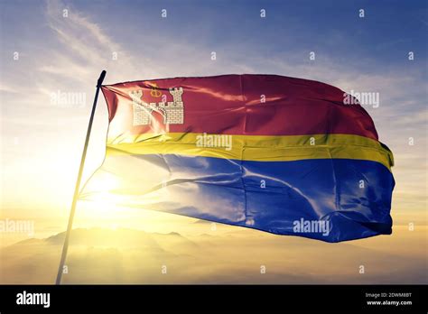 Kaliningrad Oblast Of Russia Flag Waving On The Top Sunrise Mist Fog