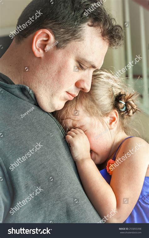 Father Comforting His Crying Daughter Photos Images And Pictures Shutterstock