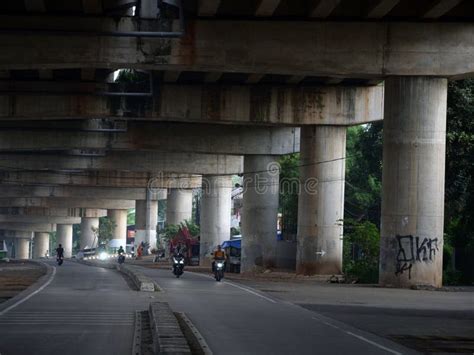 Underpass View Of A Concrete Bridge With Pillars And Road Editorial