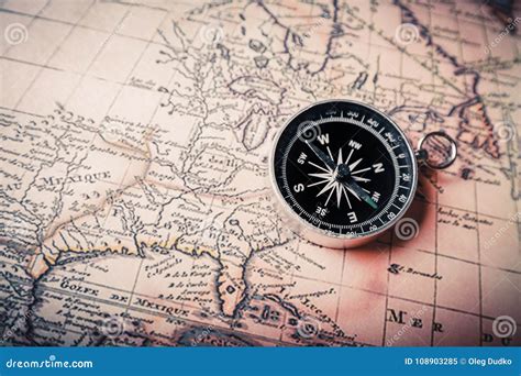 Brass Antique Compass On Old Brown Map Stock Image Image Of Bronze Equipment 108903285