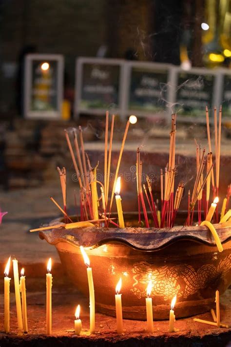 Burning Incense Sticks In A Buddhist Temple In Thailand Stock Image