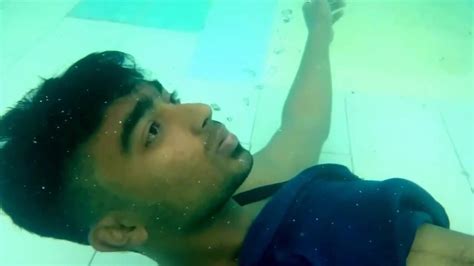 Underwater Barefaced Indian Drowning Clothed In Pool