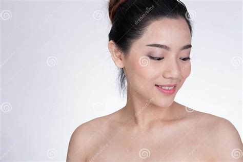 Portrait Of A Smiling Young Woman With Natural Make Up Beautiful Asian