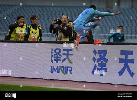 Cameroonian Football Player Benjamin Moukandjo Celebrates After Scoring A Goal Against Shanghai