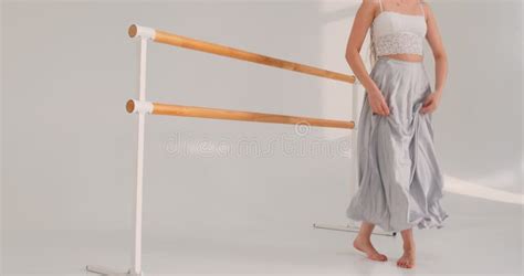 Young Girl Stretching Her Leg Holding Barrering Stock Footage Video