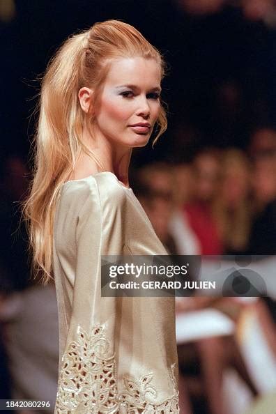 German Model Claudia Schifer Displays A Wear Created By French News