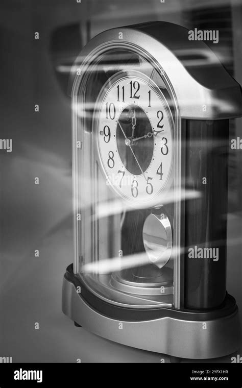 Vintage Table Clock Without Alarm On A Table View Through The Window