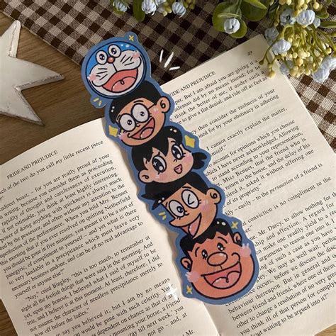 Doraemon Bookmark In 2025 Book Art Diy Quick Diy Ts Handmade Bookmarks Diy