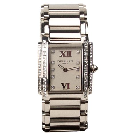Ladies Patek Philippe Twenty 4 18k White Gold And Diamond Watch 4910