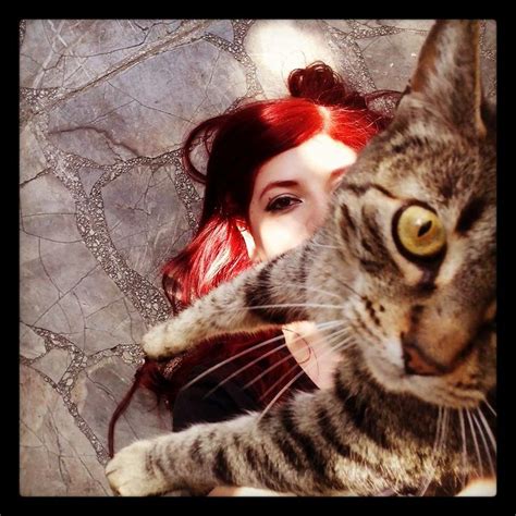 Cat And Redhead