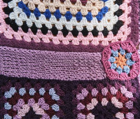Colourful Patchwork Fabric Is Sewn With Granny Squares Patterns Stock