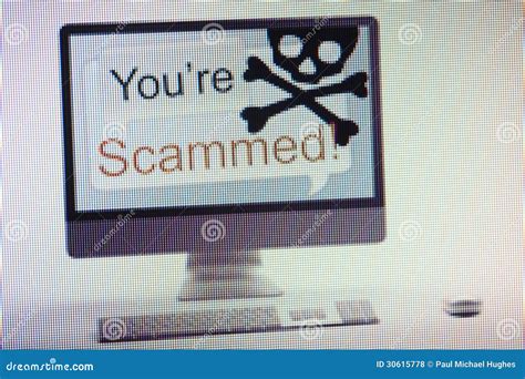 Computer Displaying Internet Fraud And Scam Warning On Screen Stock Image