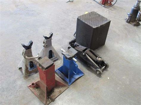 5 Assorted Jack Stands And 1 Small Floor Jack Rosen Systems