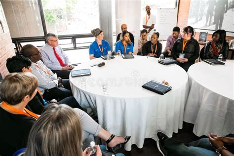 Diverse Students Attending A Networking And Leadership Workshop
