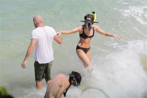 Miley Cyrus Stuns In A Skimpy Bikini During Her Mom Tish Cyrus