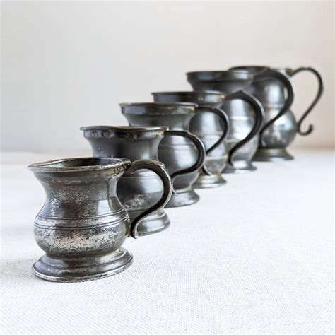 Exquisite Set Of Antique English Pewter Measuring Cups From The