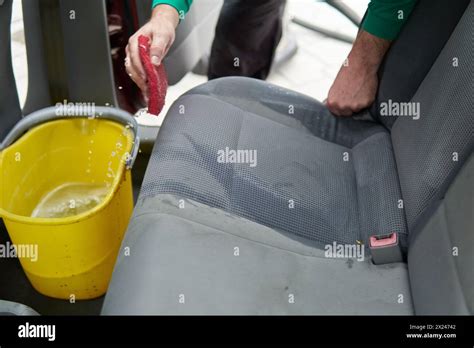 Car Cleaning Detailing Male Using Professional Steam Vacuum Chemical