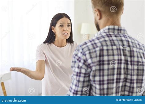 Misunderstanding In Relationship Portrait Of Offended Multiracial