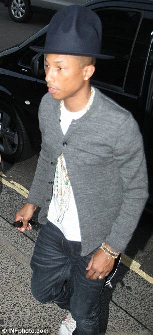 Pharrell Williams Wears Trademark Fedora To Dine At Sydney Restaurant