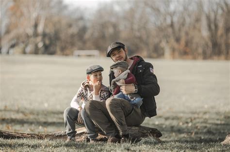 Premium Photo Fathers Day Brothers And Their Dad Enjoying Time