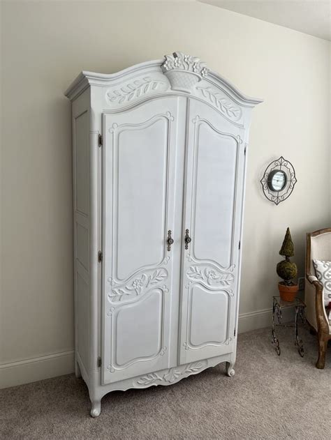 White Armoire In Bedroom With Window