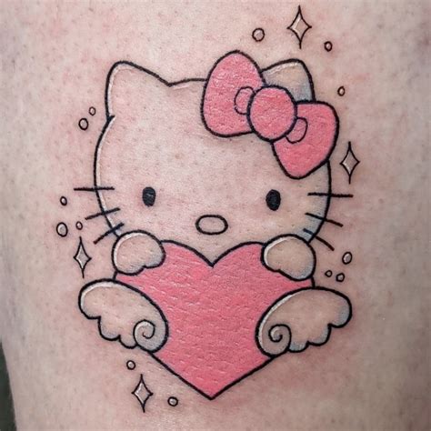 Pin By Mrs Beadle On New Tattoos Hello Kitty Tattoos Cat Tattoo Hello Kitty