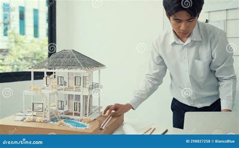 Professional Engineer Measure House Model And Using Laptop Analysis Immaculate Stock Footage