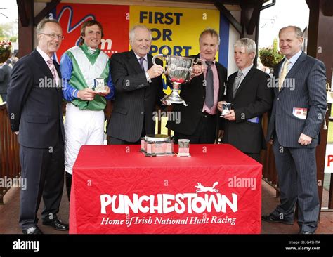 Jockey Jamie Codd 2nd Left Celebrates With The Trophy And His Team After Winning The Kfm