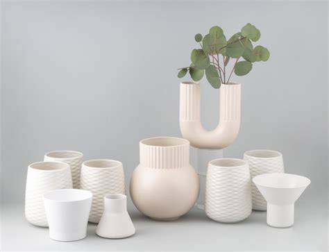 Lot An Assortment Of Contemporary Cream Ceramic Vases And Plant Pots