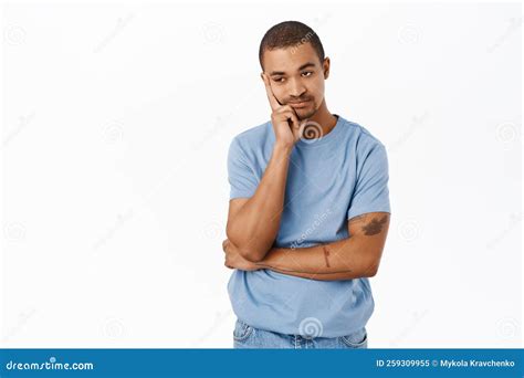 Portrait Of Man Looking Bored And Uninterested Standing Unamused