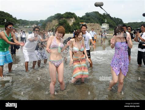 Iwaki Japan Three Local Women Working As Tour Guides Enter The Water