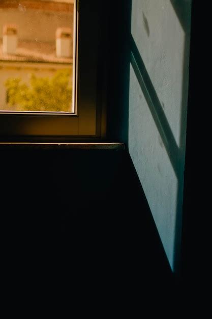 Premium Photo Window Shadows In The Dark