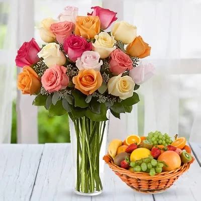 Mixed Roses In A Vase And Fruits