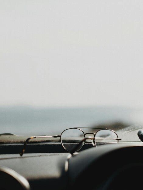 Premium Photo A Pair Of Glasses That Are On A Plane