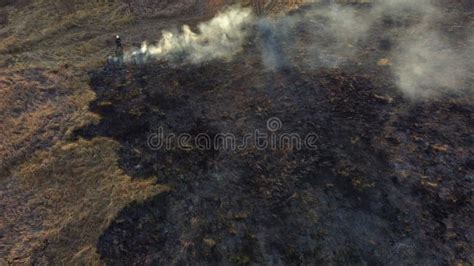 Aerial Drone View Burning Dry Grass Open Flames Of Fire And Smoke