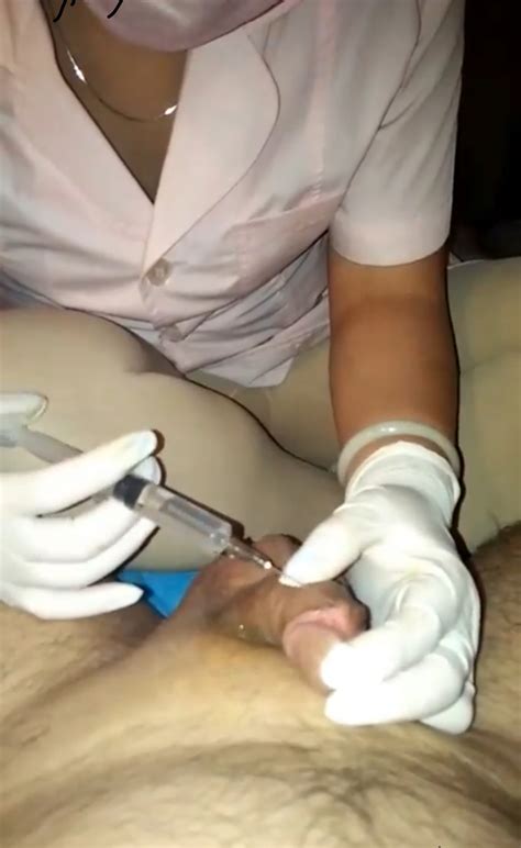 The Nurse Is Performing A Circumcision