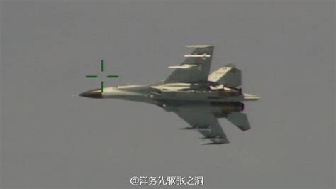 该出手就出手！中国2架歼11在南海拦截美军机新浪图片