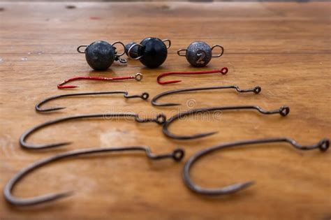 A Set Of Hooks And Lead Weights For Catching Predators With Spinning